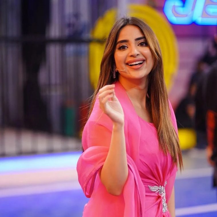 Fashionista Saboor Aly Goes Chic and Bold in Orange Crop Top - Lens