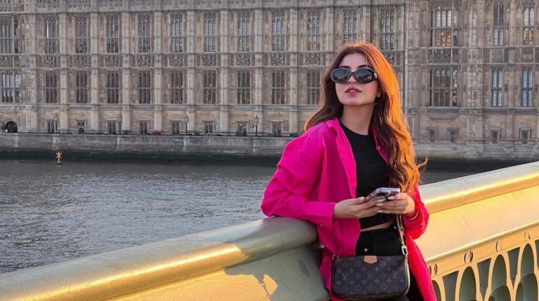 Kinza Hashmi Serves Chic Look in Hot Pink Jacket in Front of London Eye ...