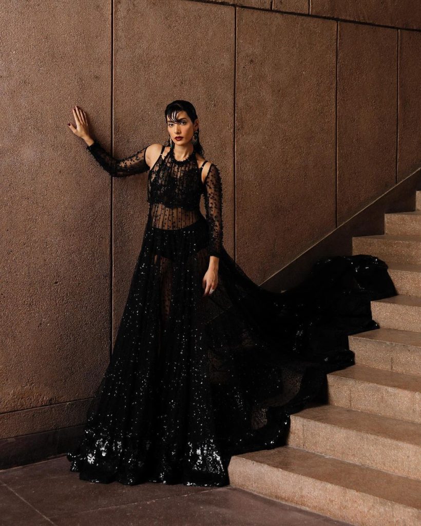 Eman Suleman is a Goth Queen in Shimmery See-Through Gown - Lens